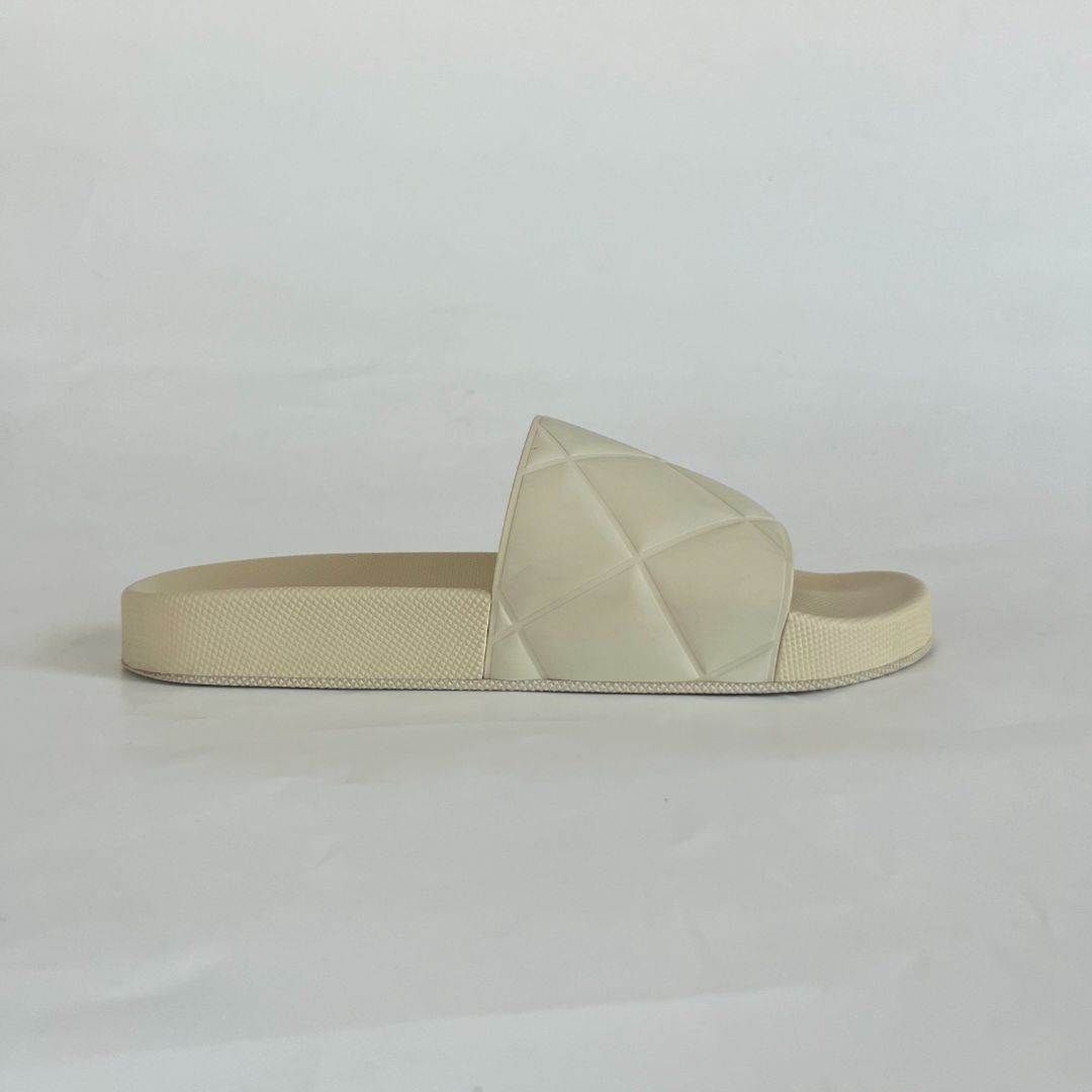 Bottega Veneta White Rubber Quilted Slides, 40 - BOPF | Business of ...